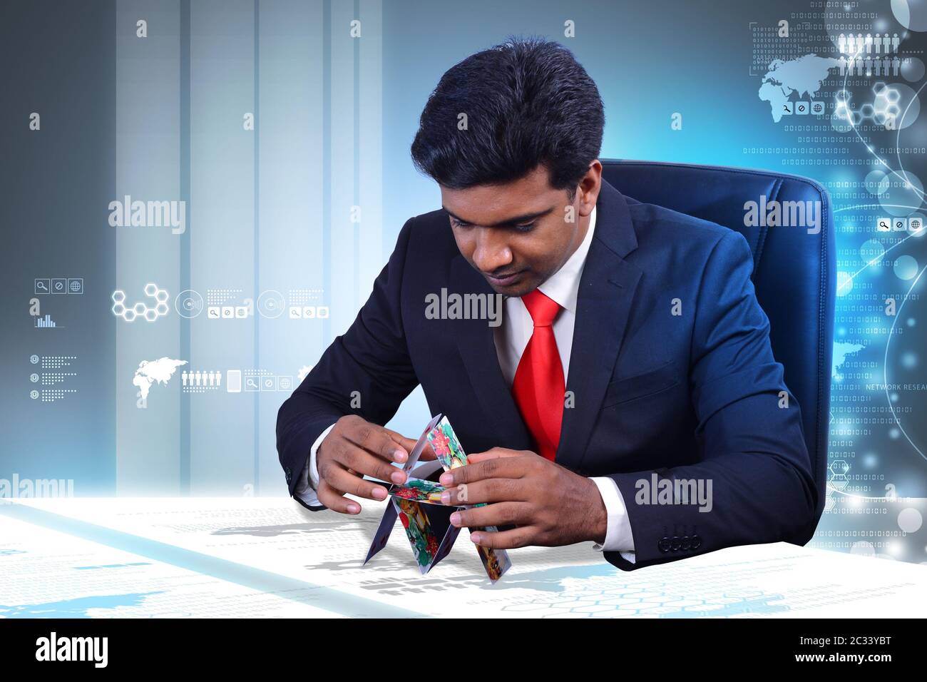 Business man creating model with cards Stock Photo - Alamy