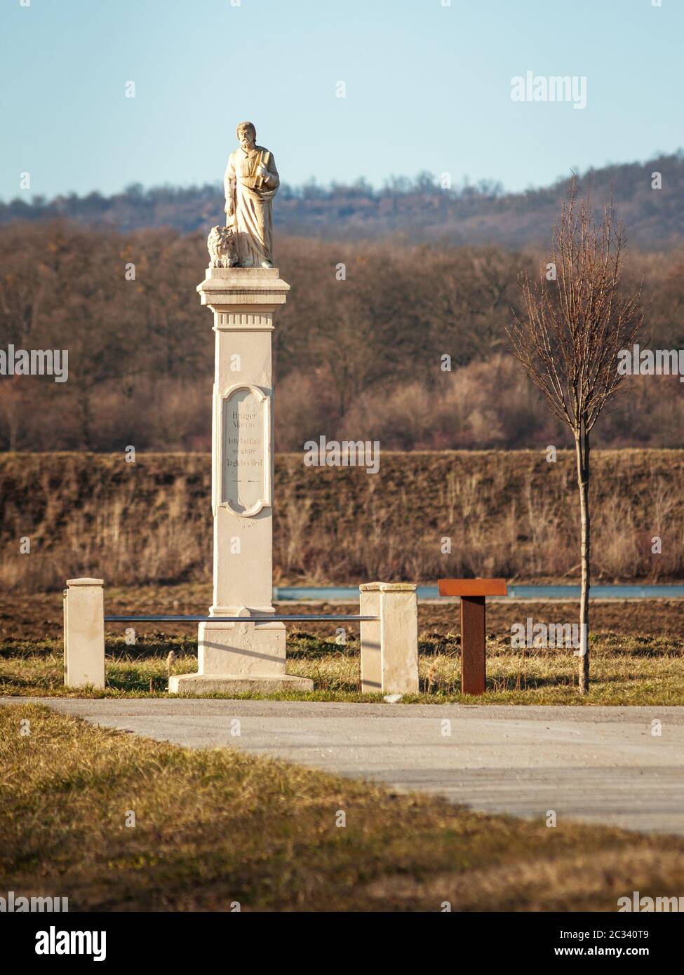 Waycroass with statue of saint marcus the martyr in burgenland Stock ...