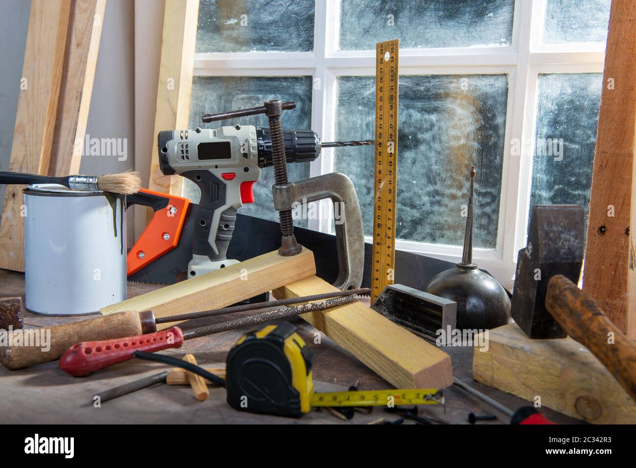some tools of carpenter in the workshop, near the window Stock Photo ...