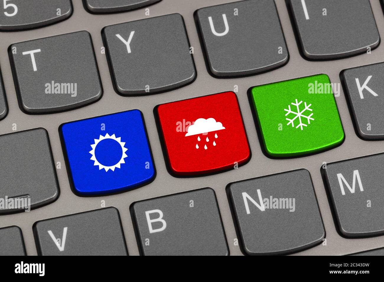 Computer keyboard with Weather key Stock Photo - Alamy