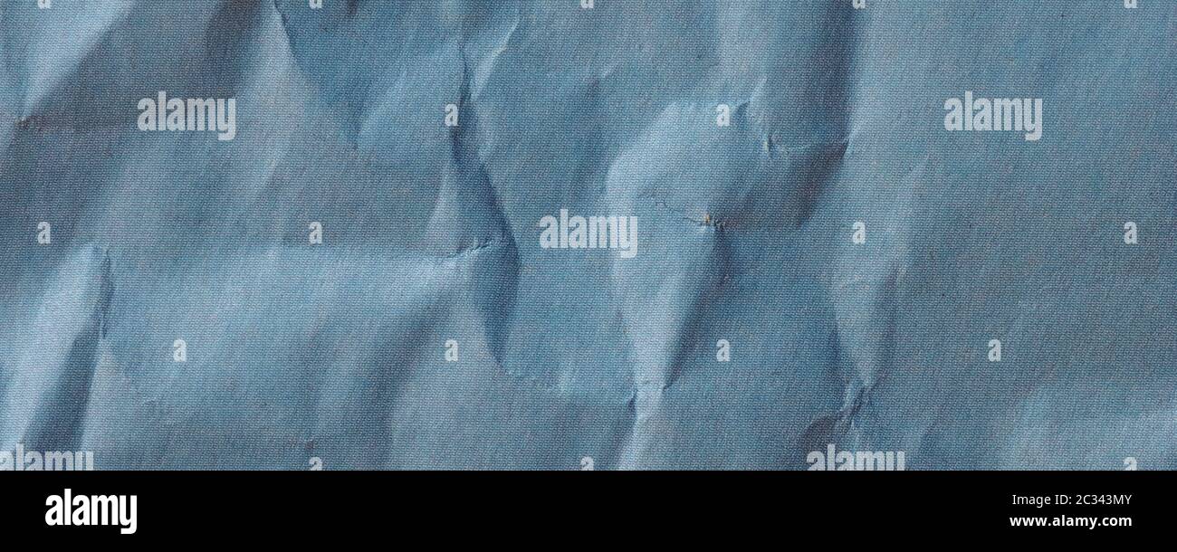wide blue crinkled paper texture useful as a background Stock Photo - Alamy