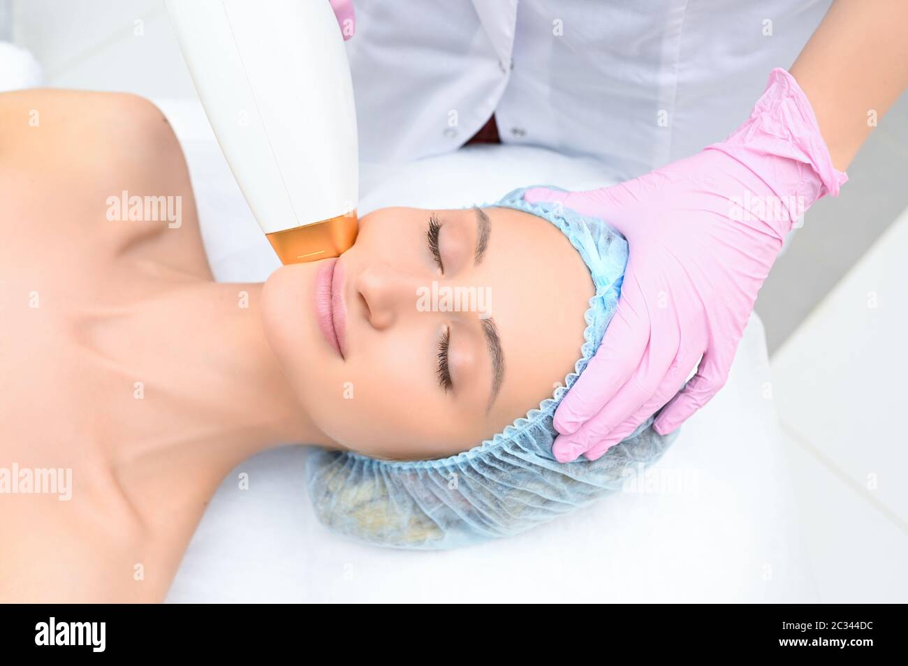 Anti-aging procedures. Skin care concept. Woman receiving facial beauty ...