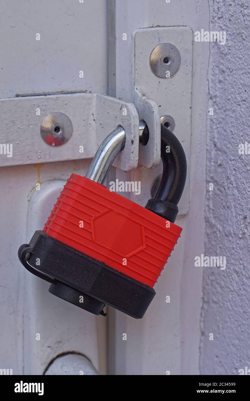 Big red strong padlock storage protection safety Stock Photo - Alamy