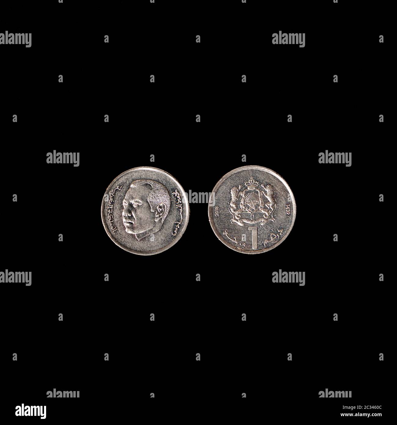 the 1 Dirham coin of Morocco front and back on a black background Stock ...