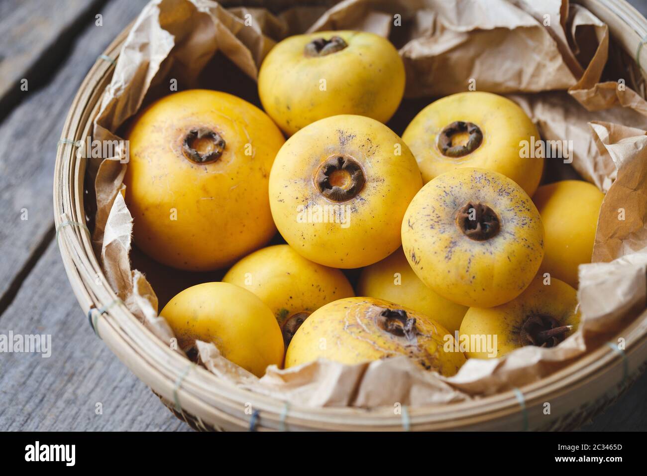 Gold apple fruit-Diospyros decandra fruit Stock Photo - Alamy