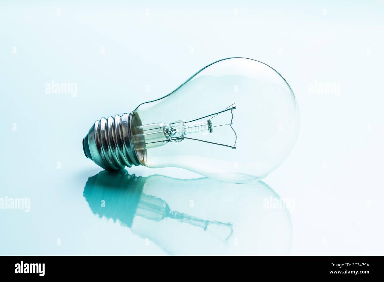 Classic light bulb on colorful background Stock Photo - Alamy