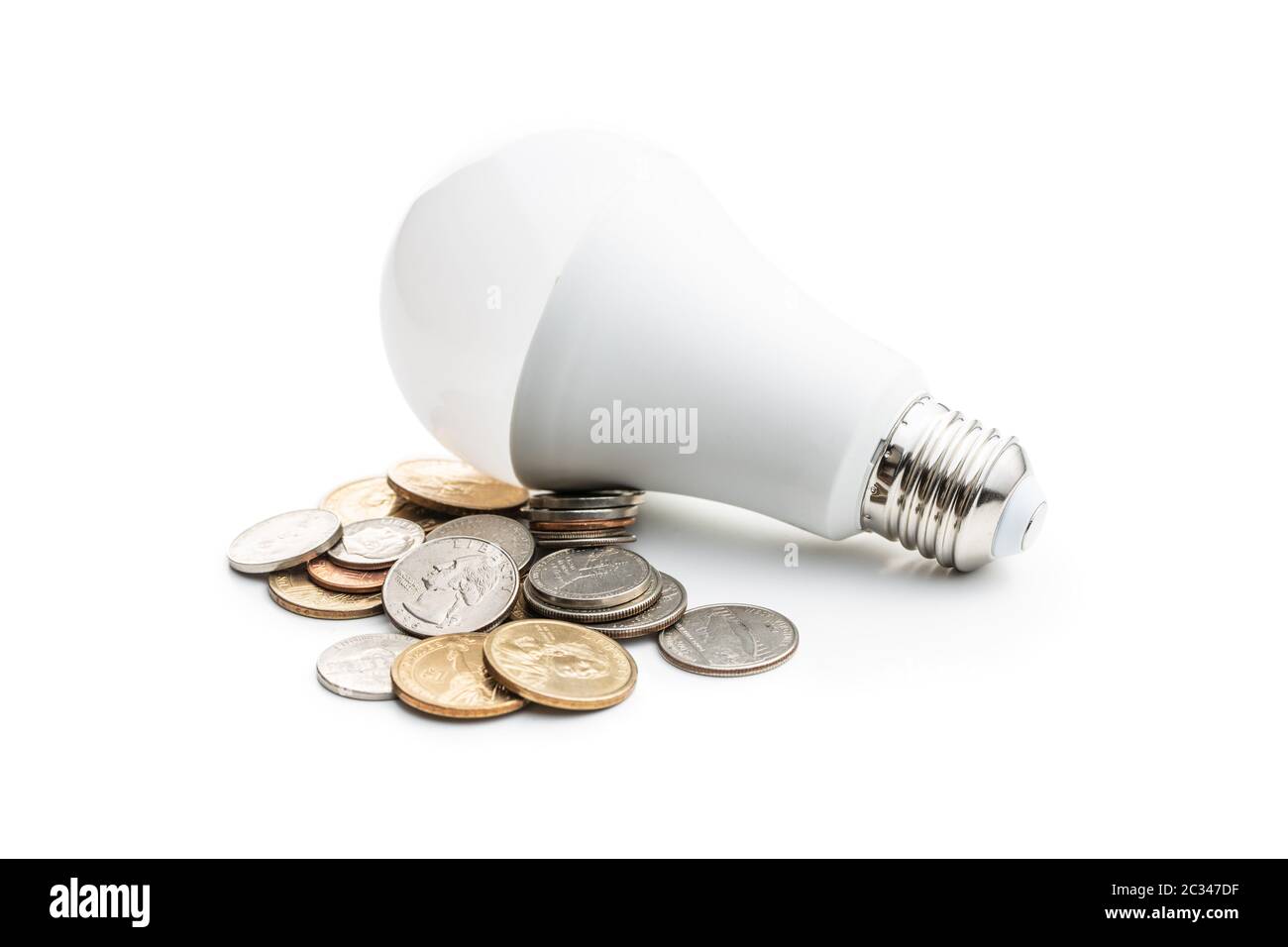 Energy saving light bulb and dollar coins isolated on white background ...