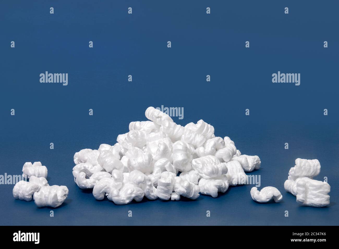 Polystyrene or white styrofoam packing pieces used for minimize bumps ...