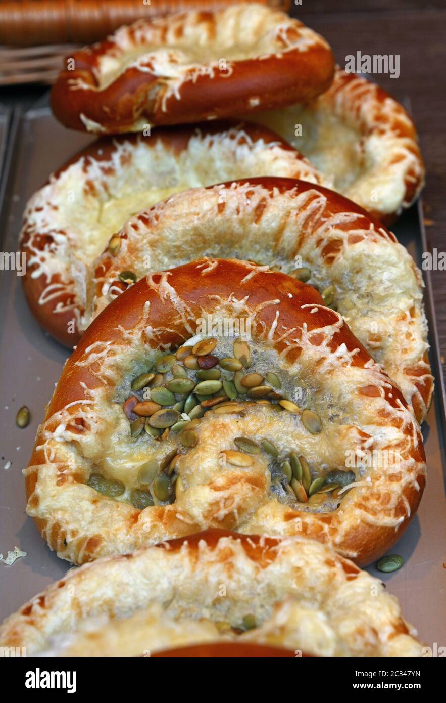 Close up several fresh traditional German pretzel bread knots with ...