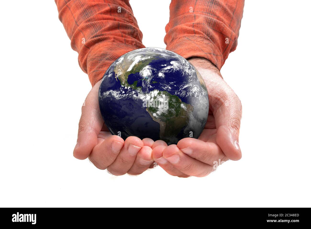 man hands holding Planet Earth on a white background. Some Elements of ...
