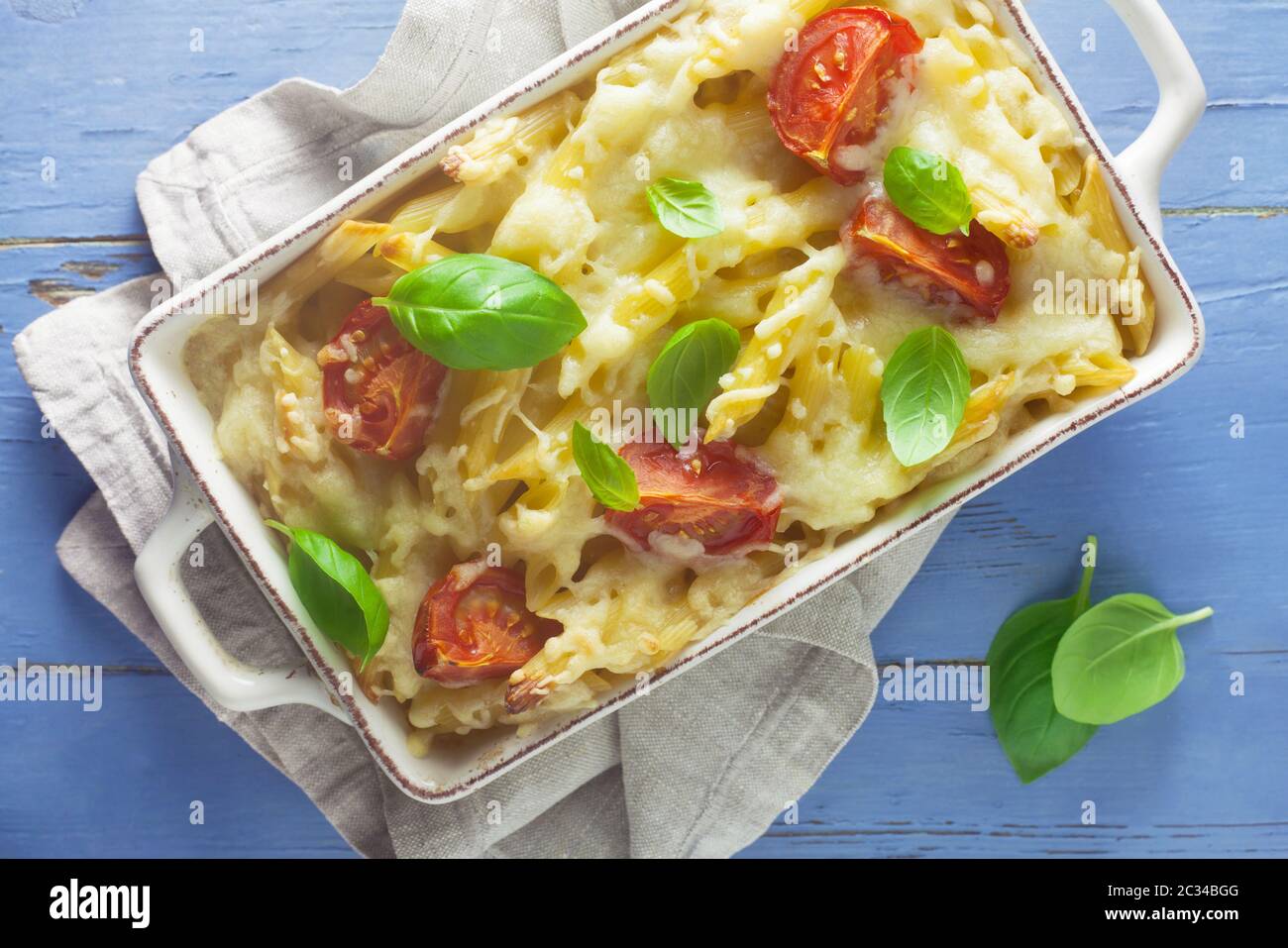 Top View Of Pasta Au Gratin On A Blue Background Stock Photo - Alamy