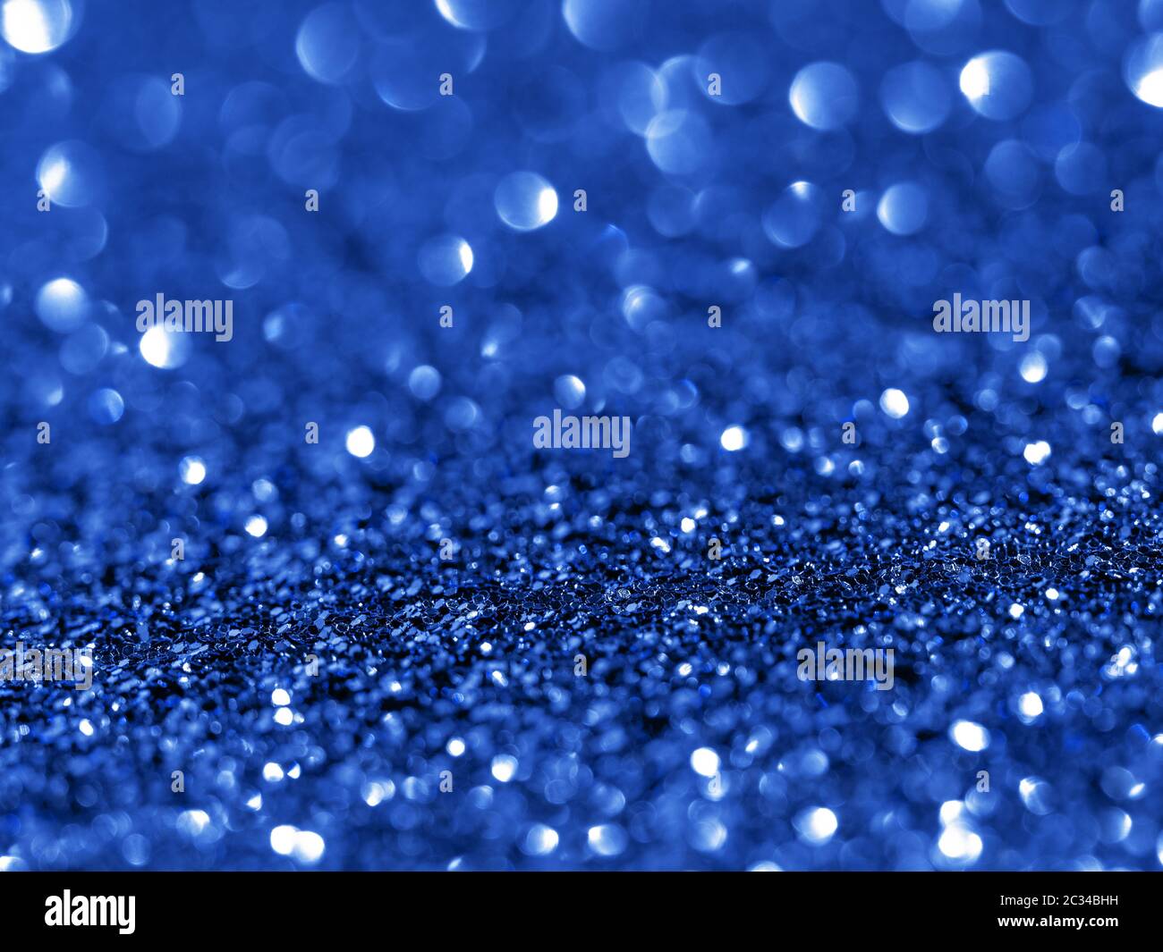 Sparkling background with bokeh made of Classic Blue 2020 color. Color ...