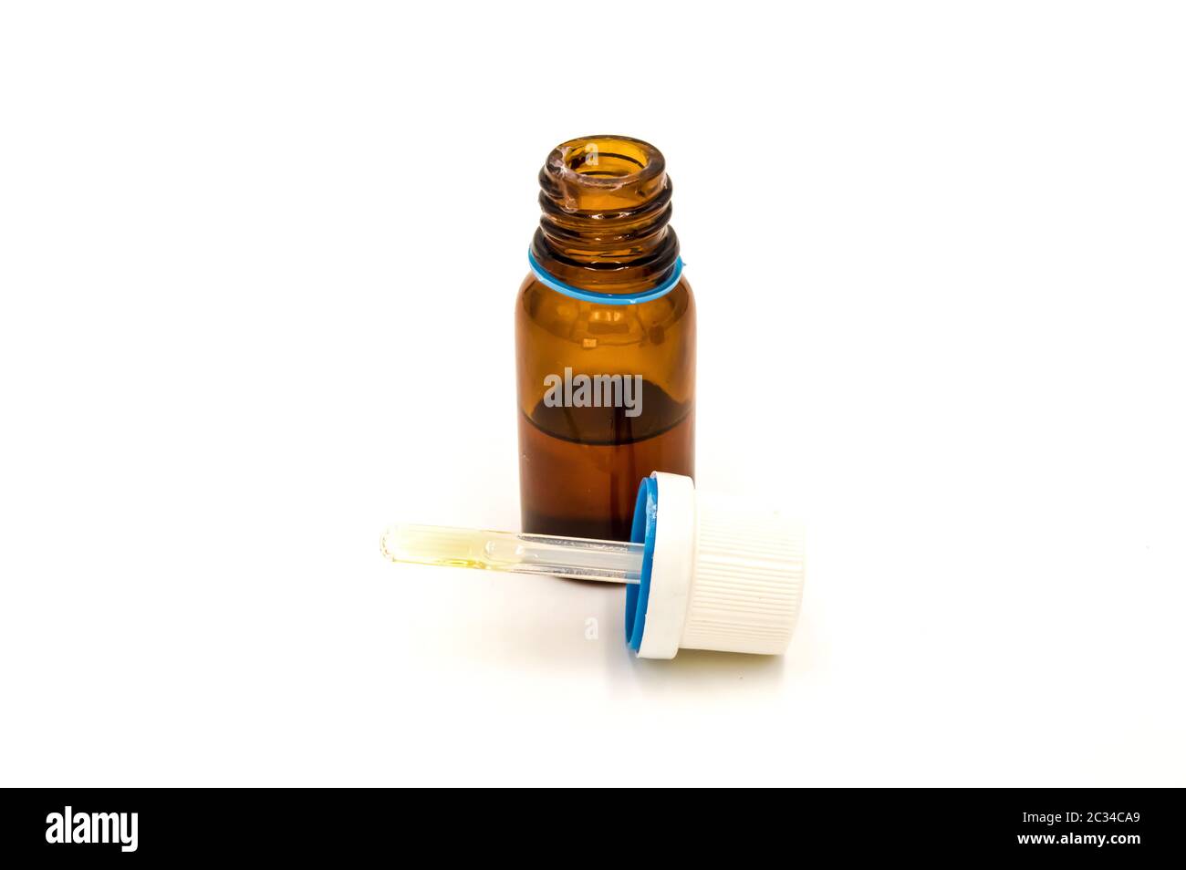 A brown pharmacy bottle with a dropper on a white background Stock ...