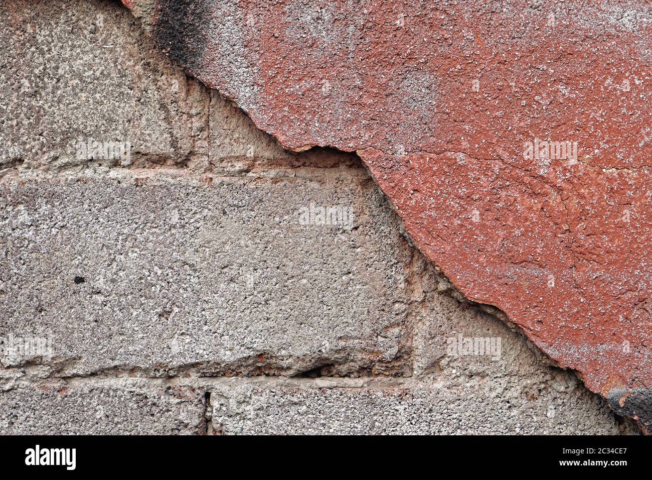 Damaged wall crack with diagonal line background Stock Photo - Alamy