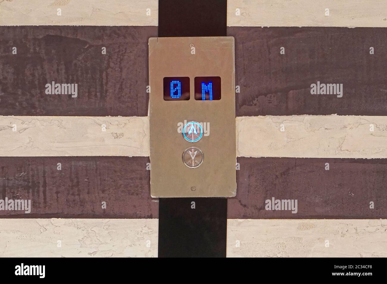 Modern lift call buttons with display Stock Photo - Alamy