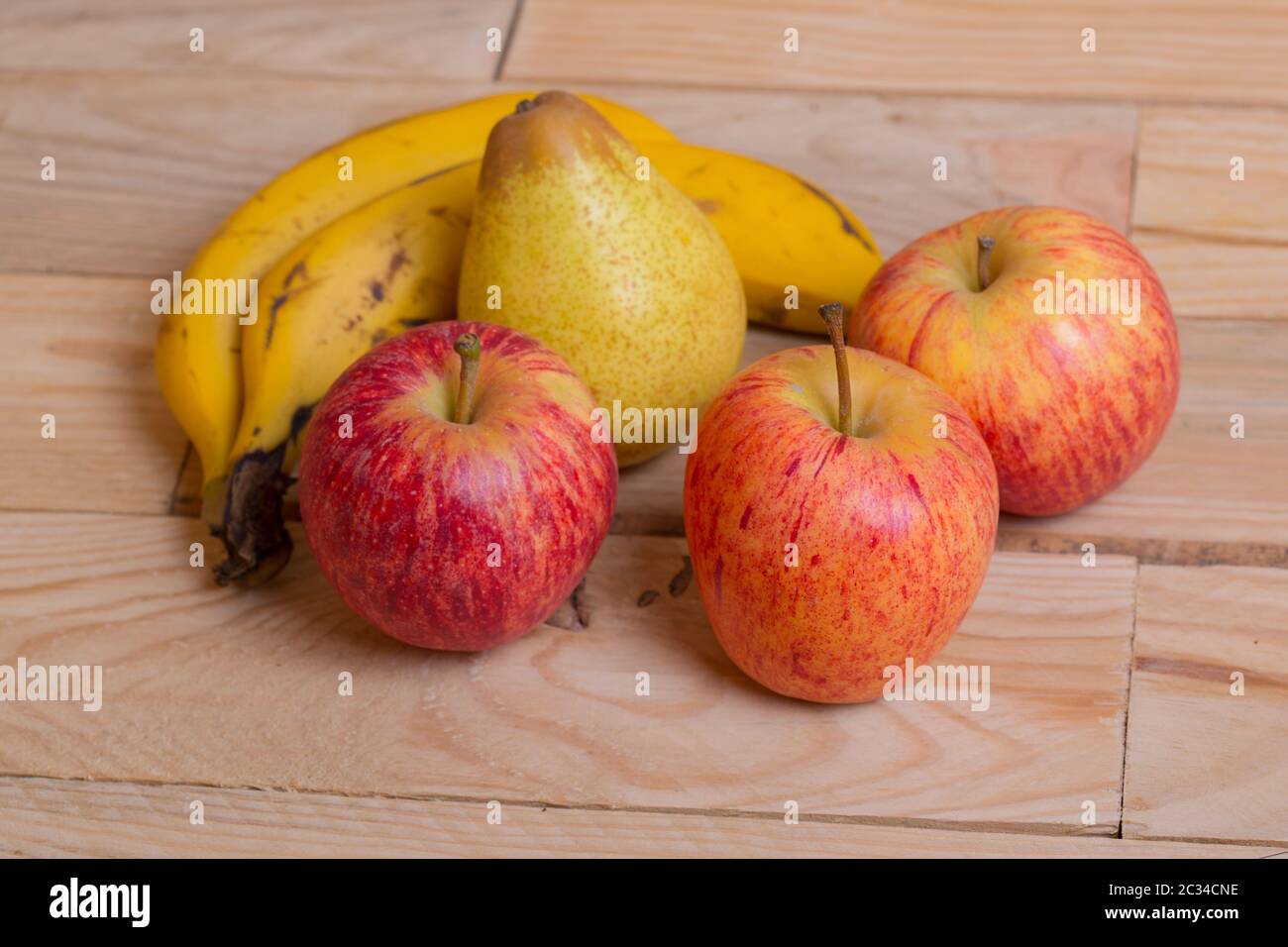 fruits on wooden table, studio picture Stock Photo - Alamy