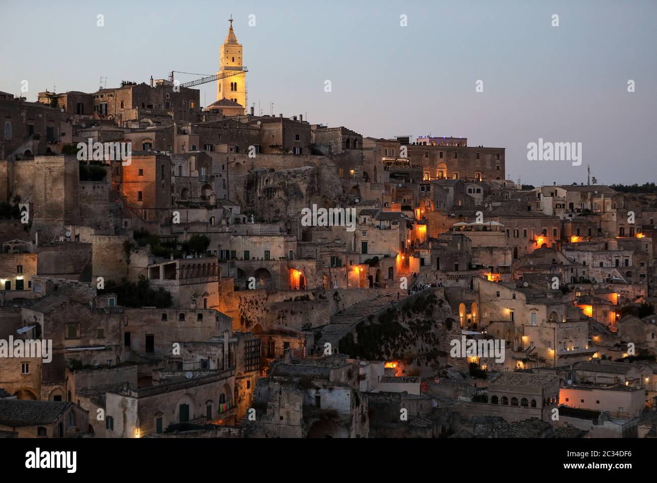 Amazing lighted buildings in ancient Sassi district by night in Matera ...