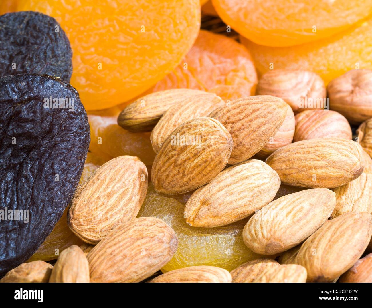 delicious dried fruit apricots with nut kernels-healthy food from dried ...