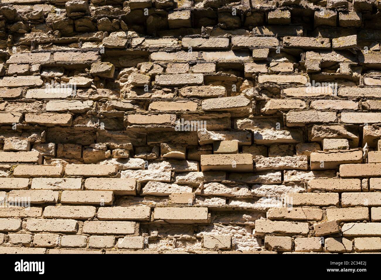 old clay orange bricks in abandoned ruined red brick building, fortress ruins in Europe Stock ...