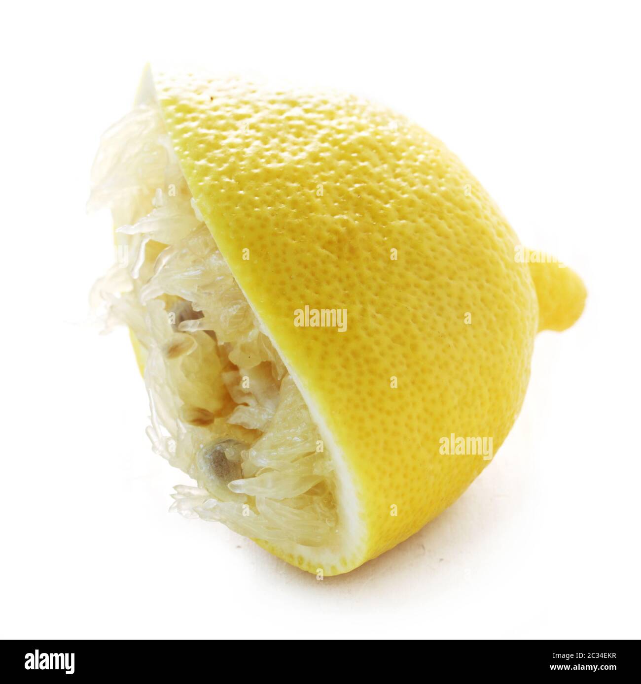 Squeezed Lemon Isolated On White Stock Photo - Alamy