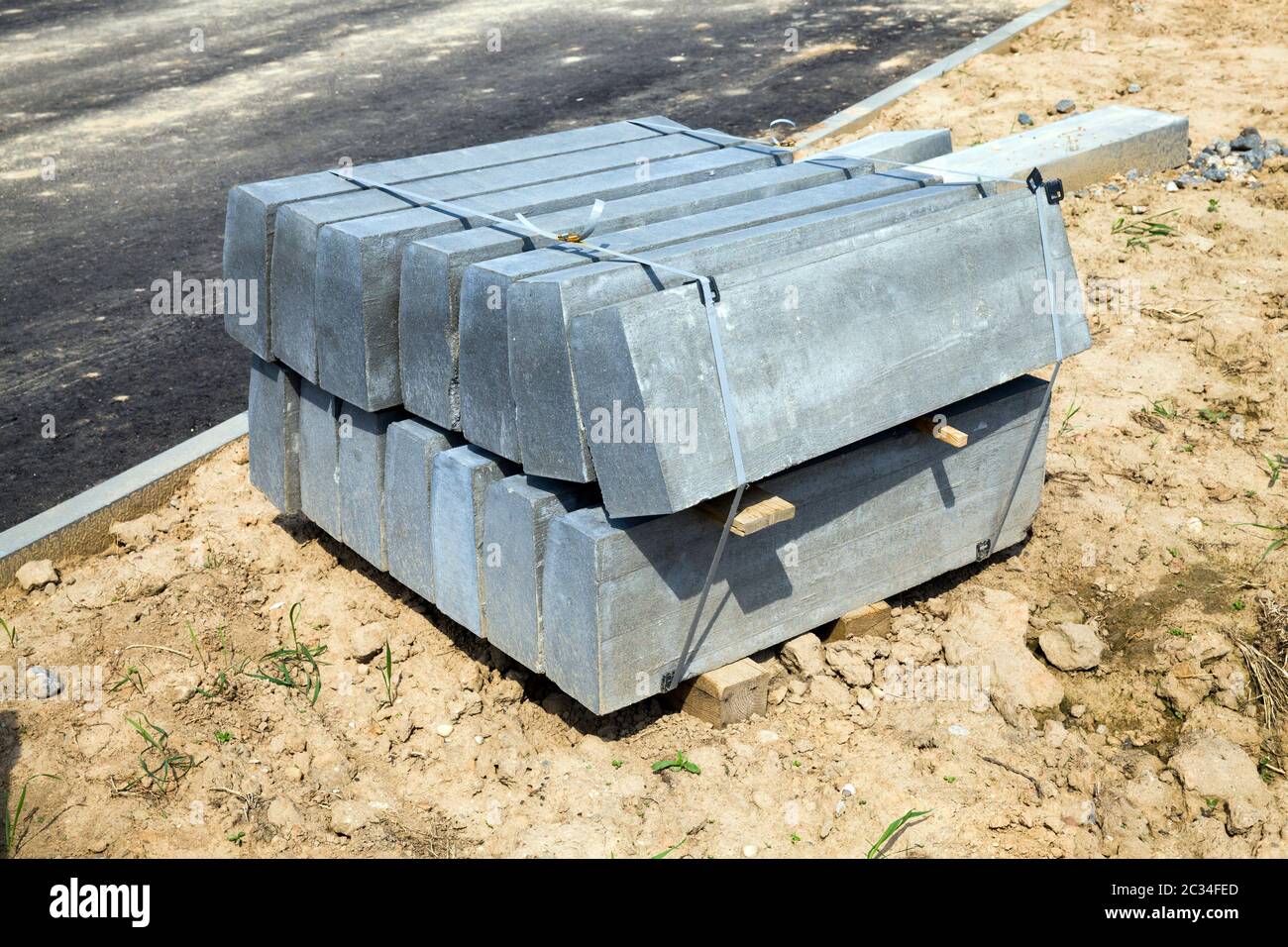 large and long concrete curbs in the package at the construction site ...