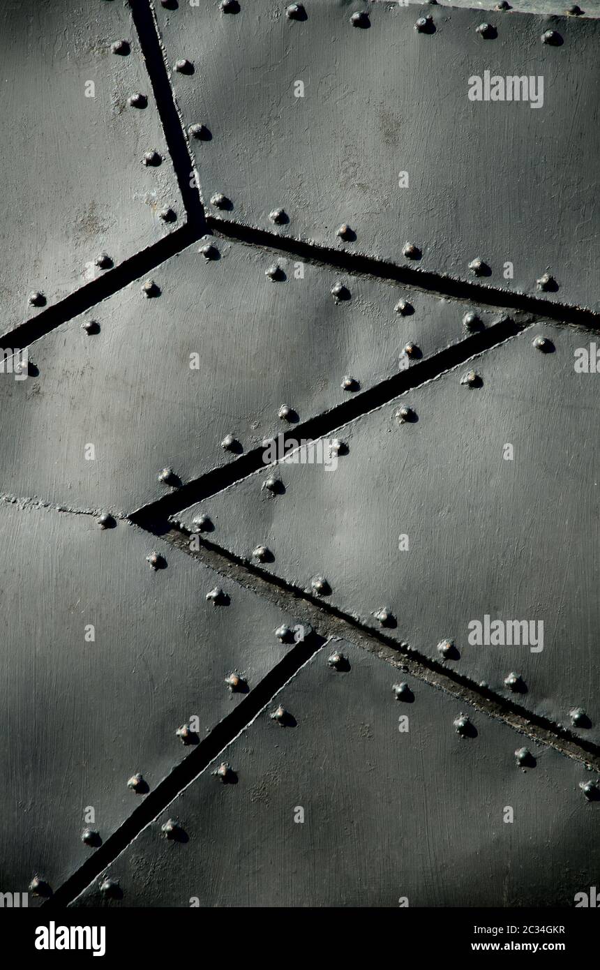Cast steel armor with rivets Stock Photo - Alamy