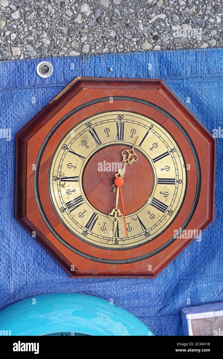 Octagonal wall clock with wood Stock Photo - Alamy