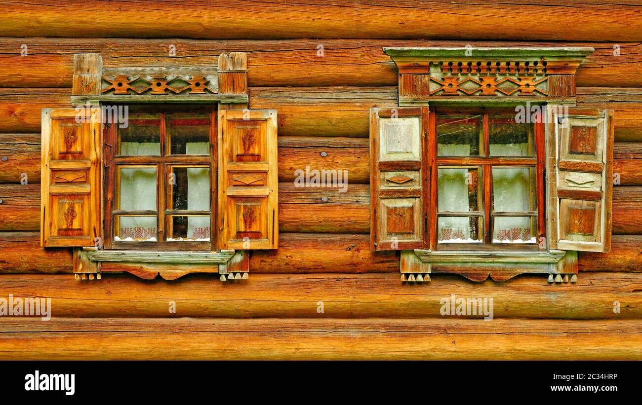 Two vintage wooden windows in russian national style Stock Photo - Alamy