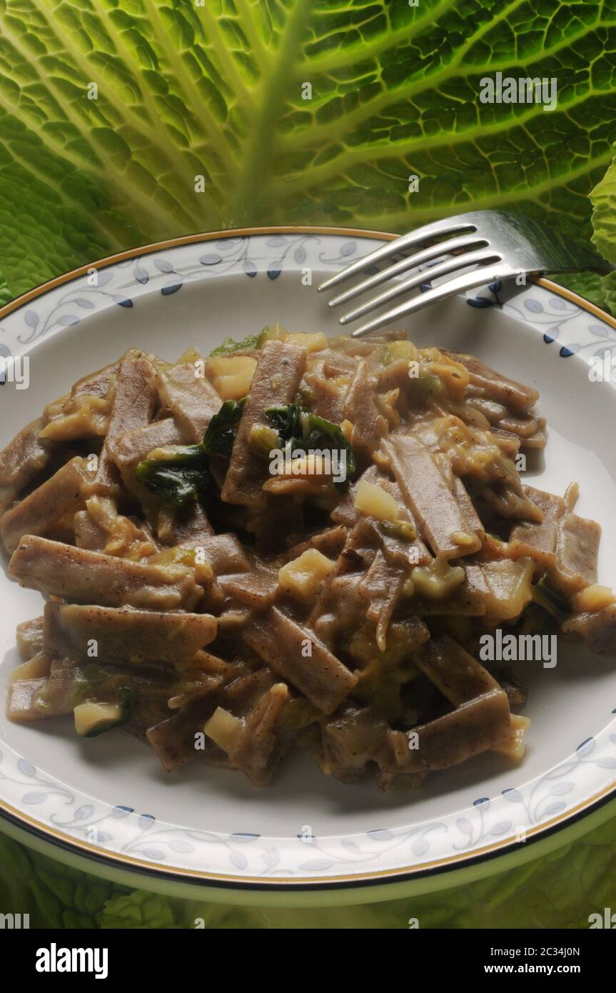 Pizzoccheri dish pasta with buckwheat Stock Photo - Alamy