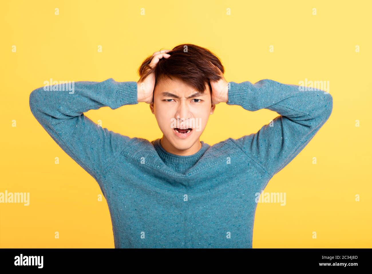 young man yelling and screaming Stock Photo - Alamy