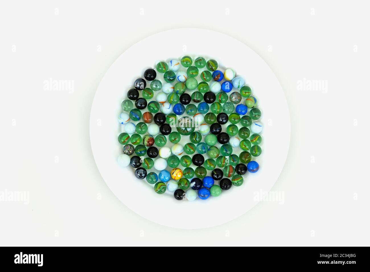 Colored glass balls on 360 degree rotating stand Stock Photo - Alamy