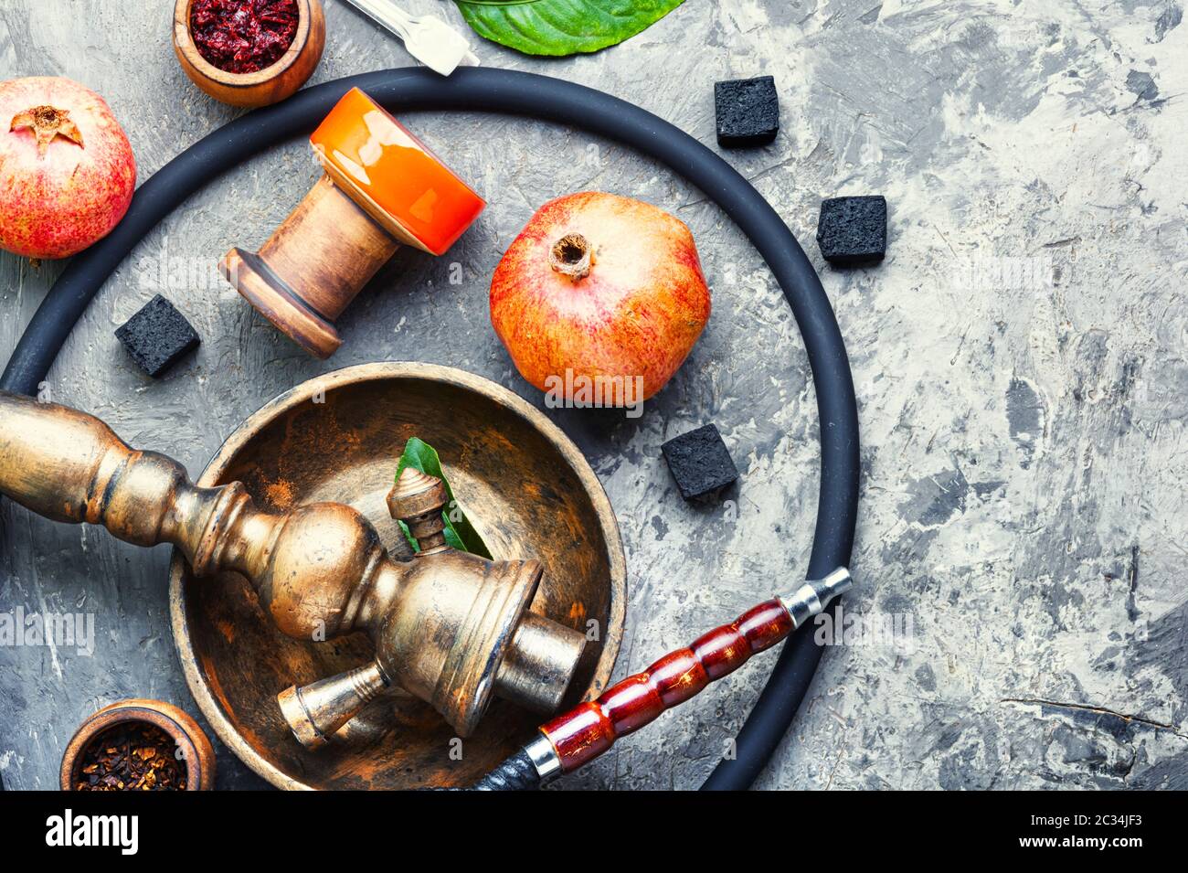 Arabic smoking hookah.Pomegranate flavor hookah.Fruit tobacco shisha ...