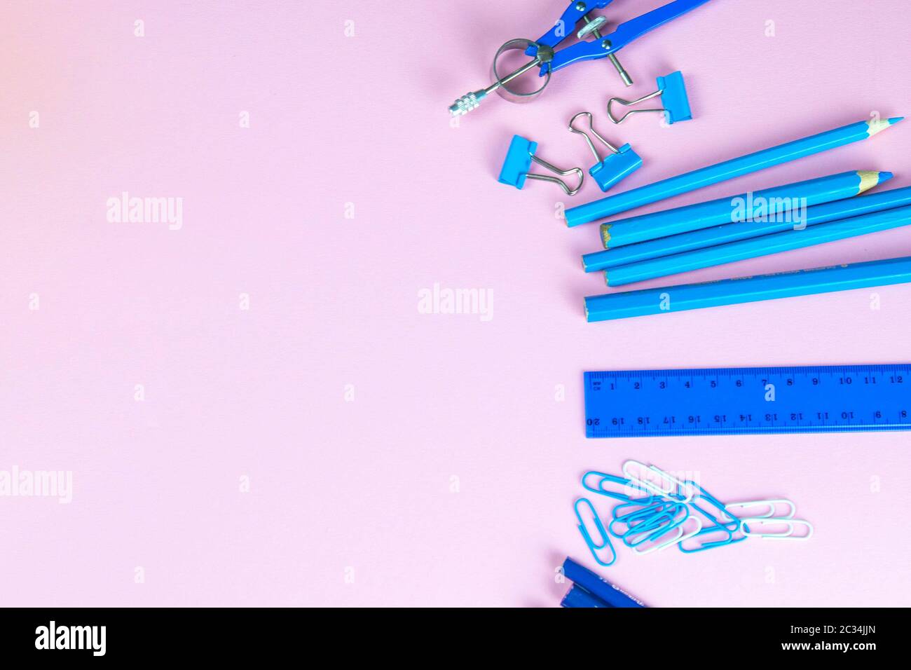 Multi-colored blue pencils rulers, pens, pencils and scissors and ...