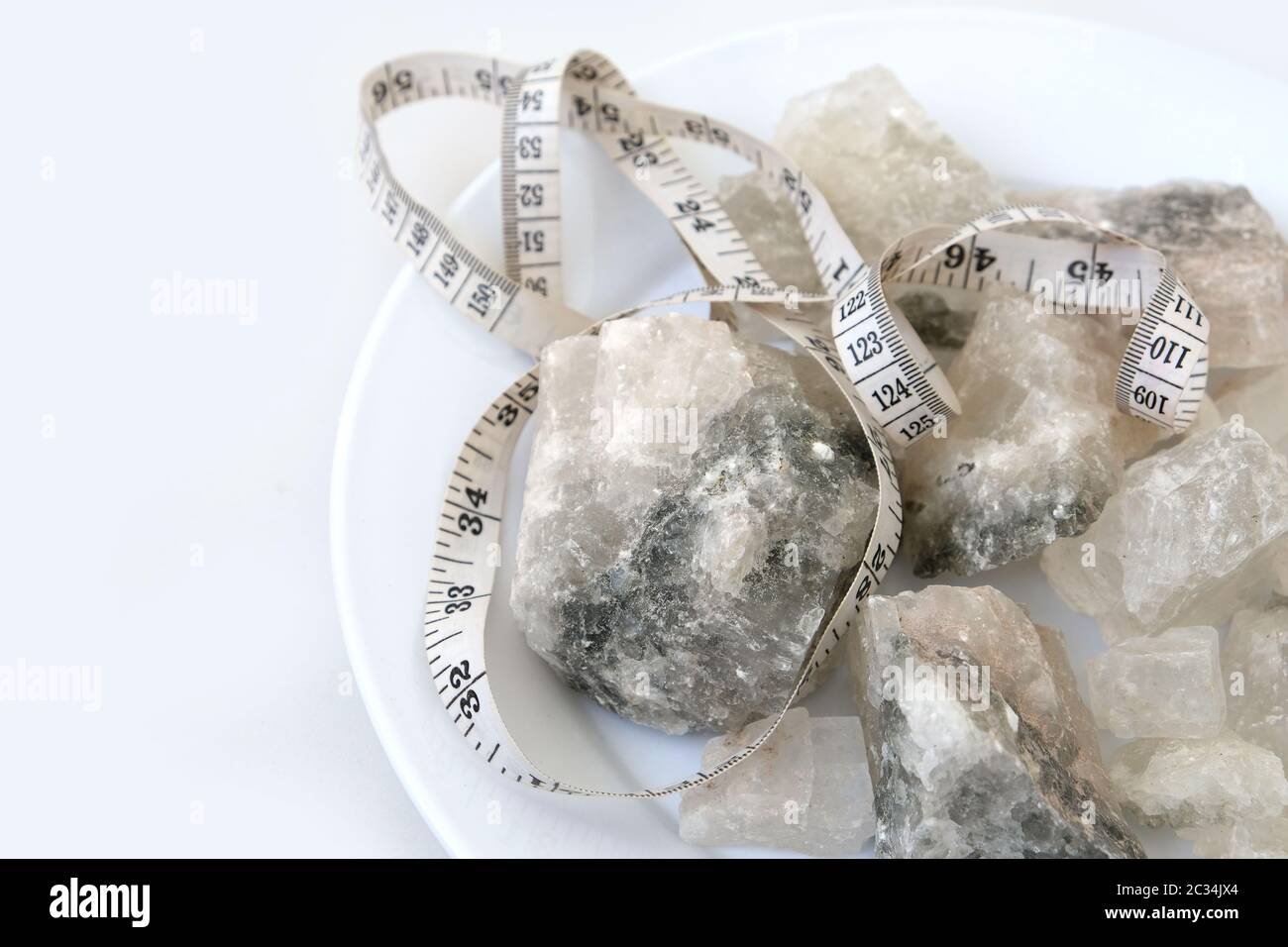 salt and weight gain, the harm of salt for man Stock Photo - Alamy