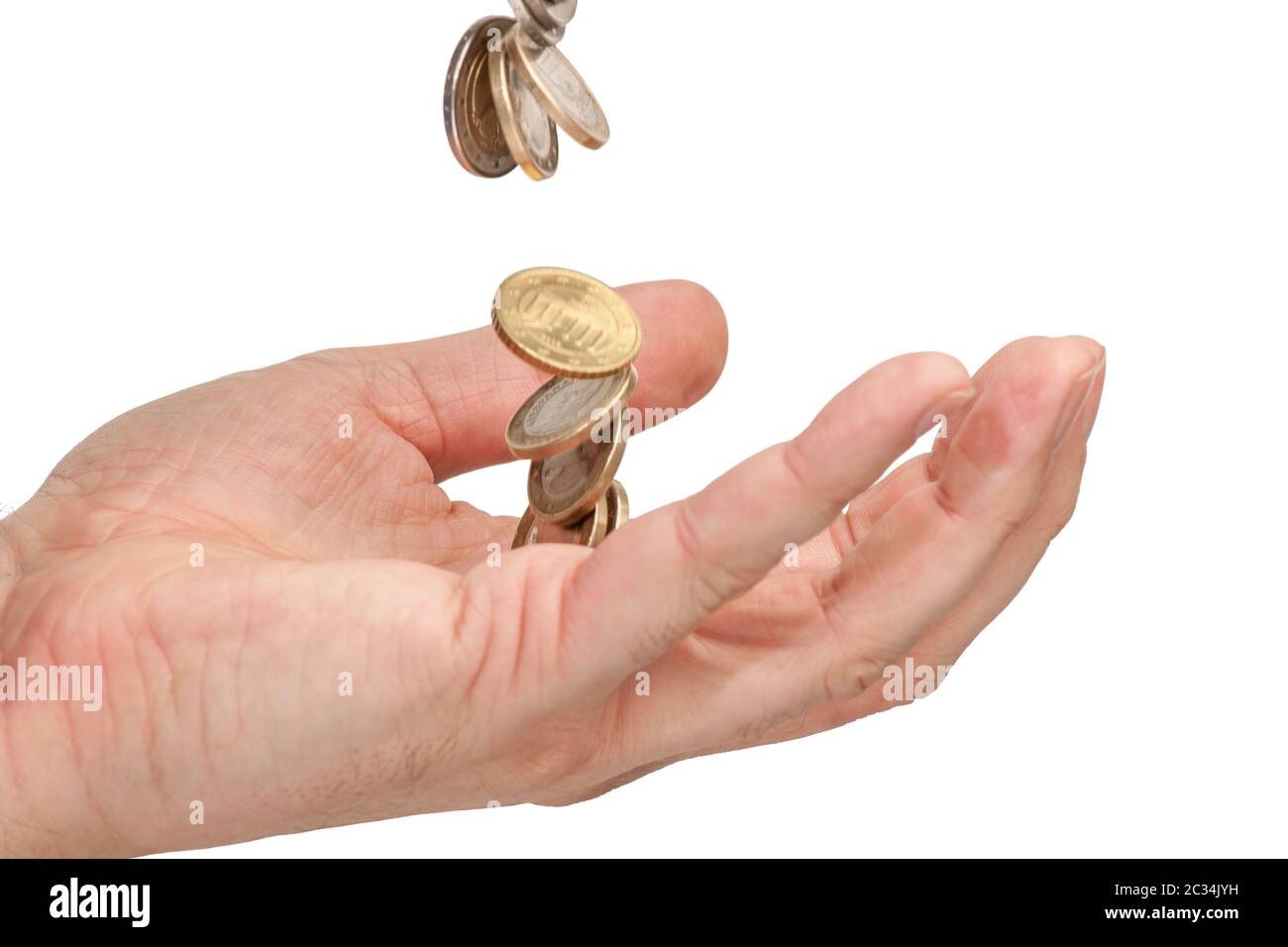 Side detail view of a male hand under falling euro coins against white ...