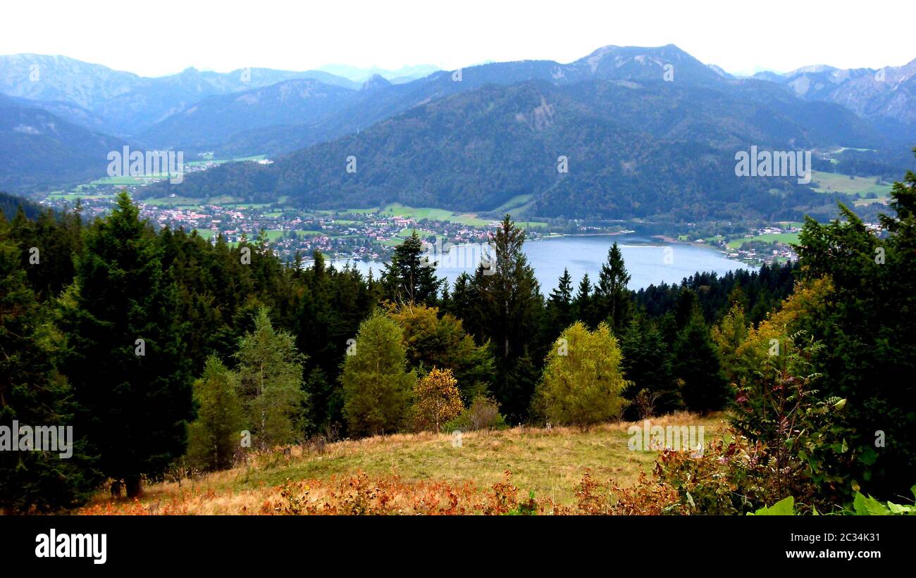 Village in a valley with mountains in the background hi-res stock ...