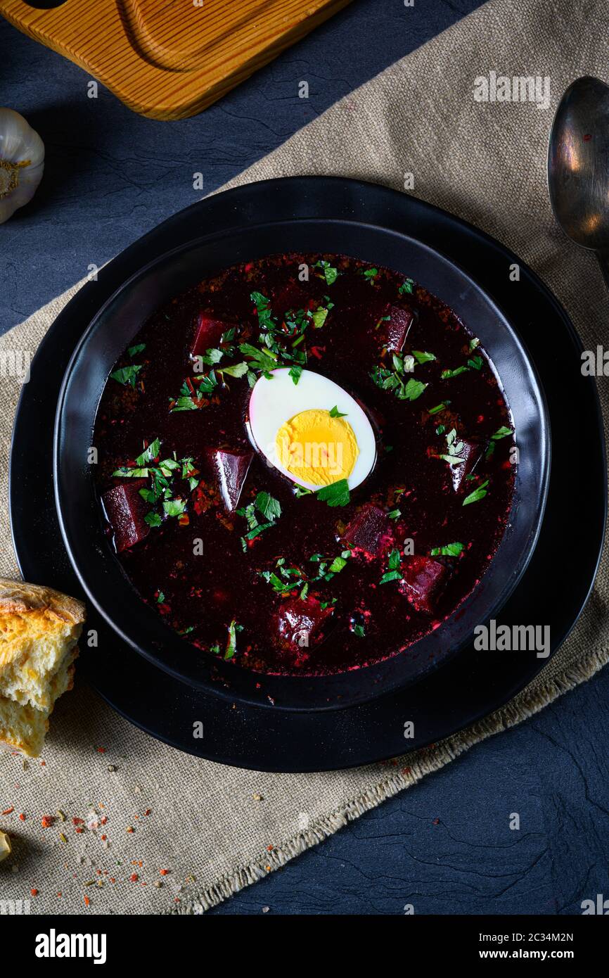 Delicious beetroot borscht with egg Stock Photo - Alamy