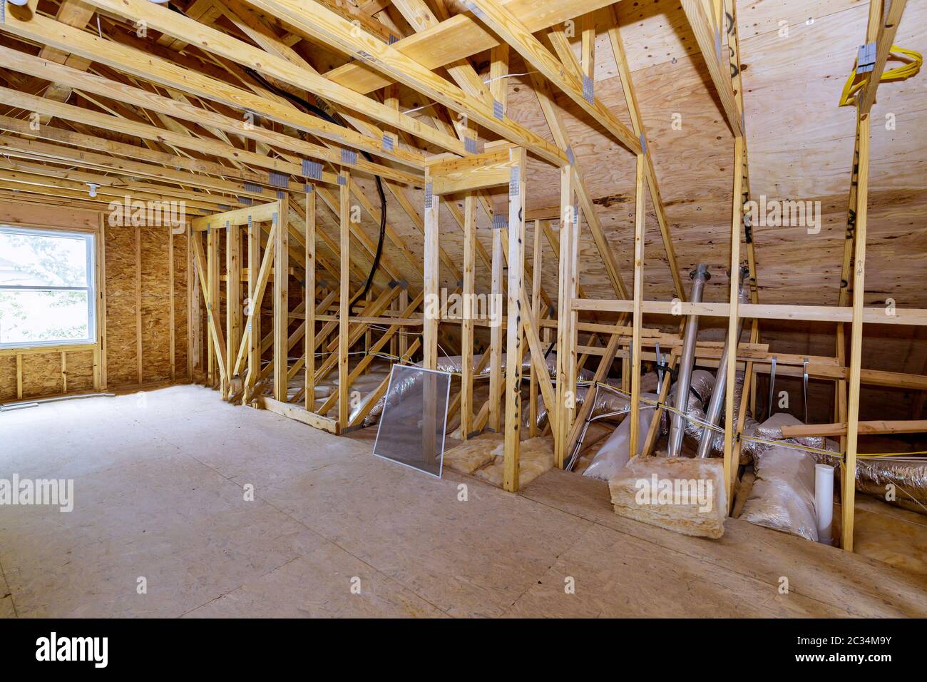 House attic under construction interior inside a frame walls beam built ...