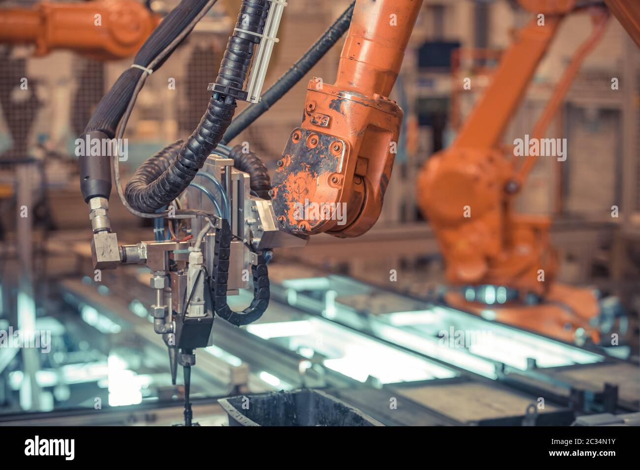 robotic arm for automated production of components for the automotive ...