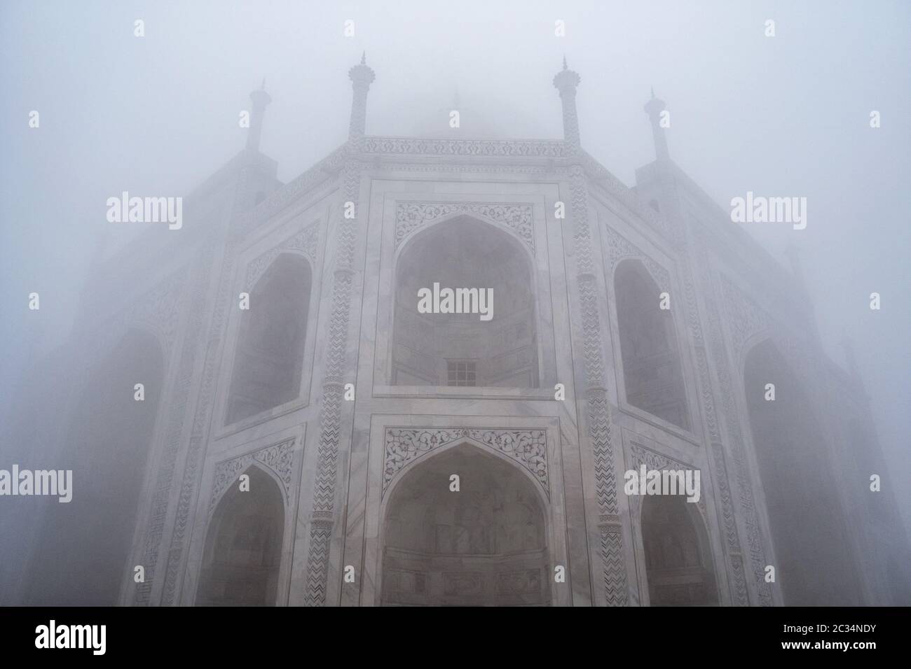 taj mahal covered in fog Stock Photo - Alamy
