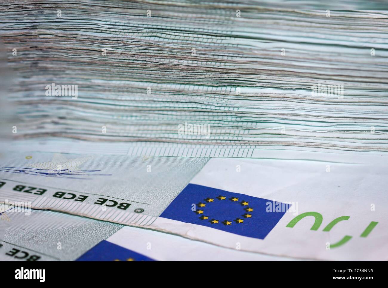 several thousand euros in banknotes, banknotes bundled on a pile Stock ...