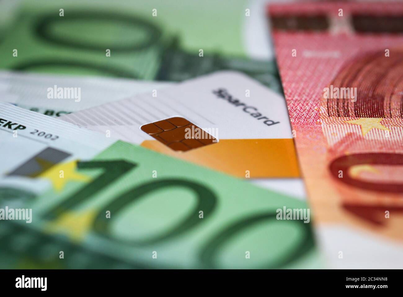 several thousand euros in banknotes, banknotes bundled on a pile Stock ...