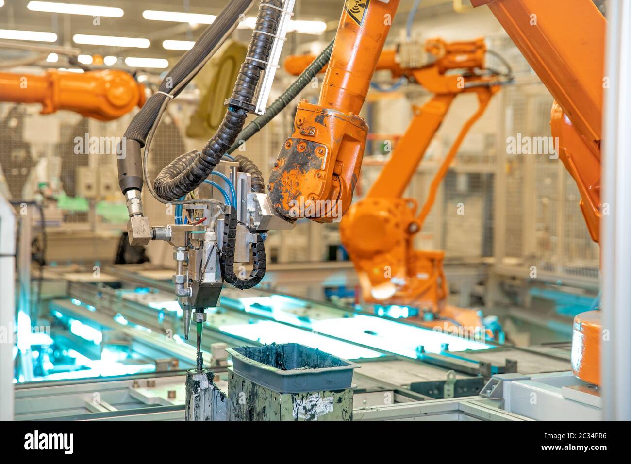robotic arm for automated production of components for the automotive ...
