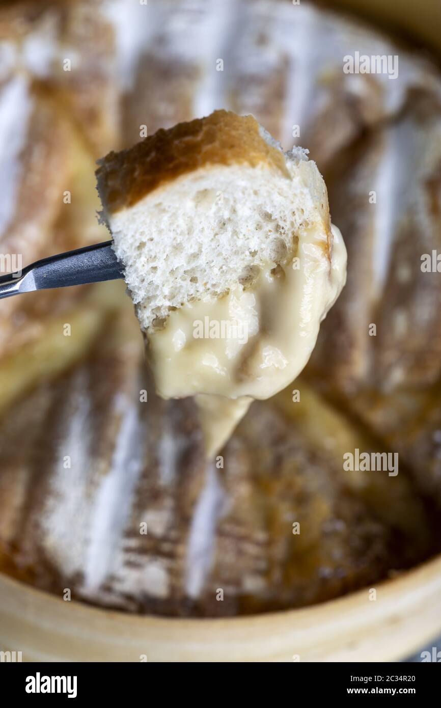swiss cheese fondue with bread Stock Photo - Alamy