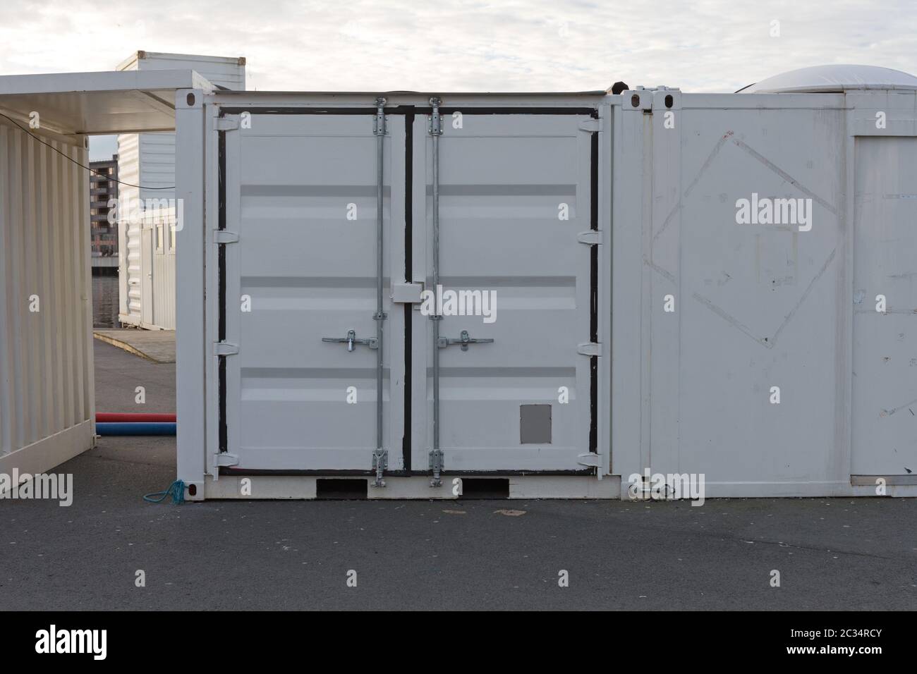 Closed Doors at Clean White Cargo Container Temporary Stock Photo - Alamy