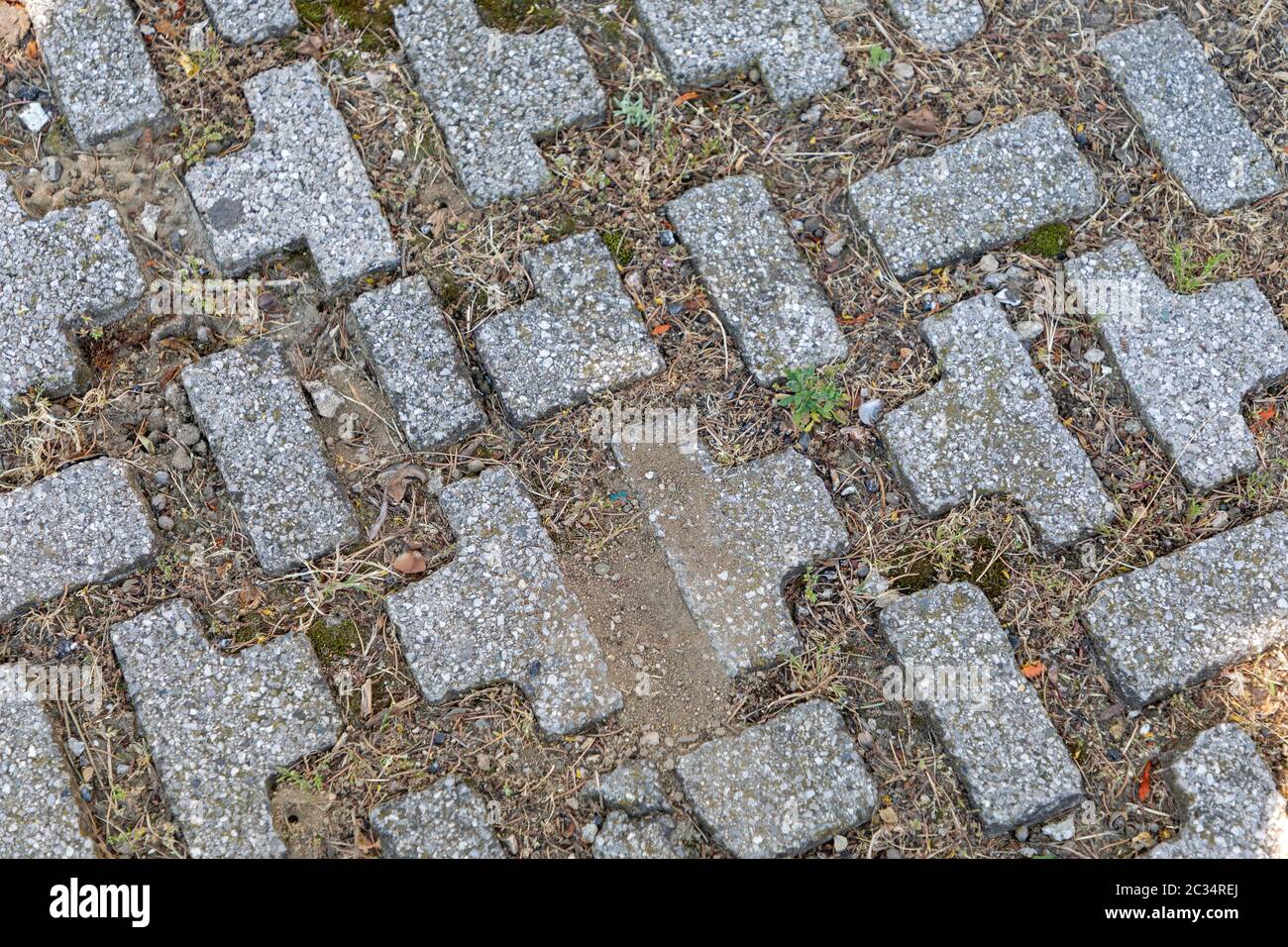 Puzzle Shaped Stone Blocks Pieces at Ground Stock Photo - Alamy