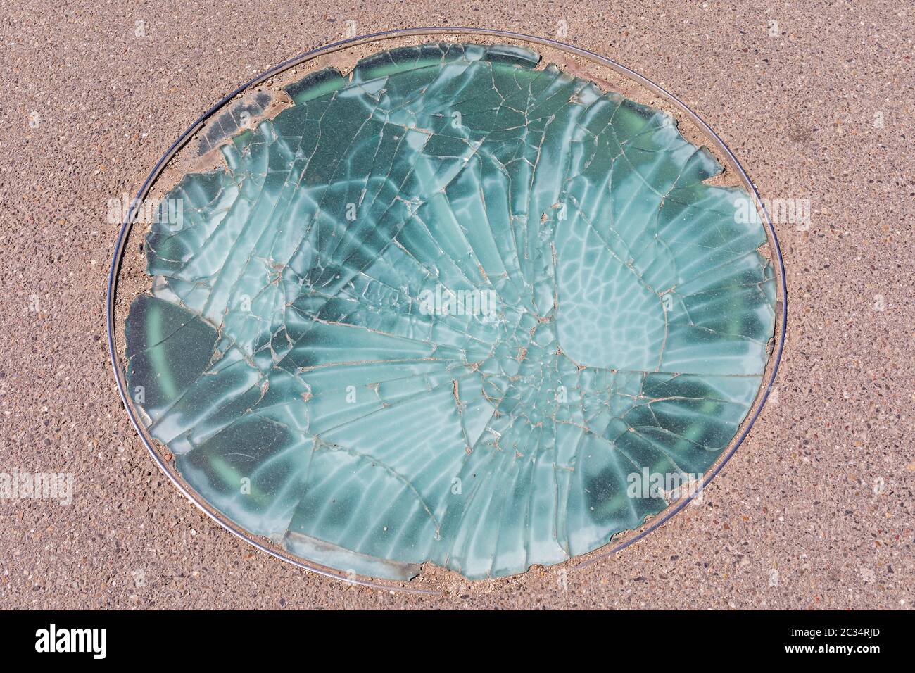 Broken Glass Damage at Floor Round Reflector Stock Photo - Alamy