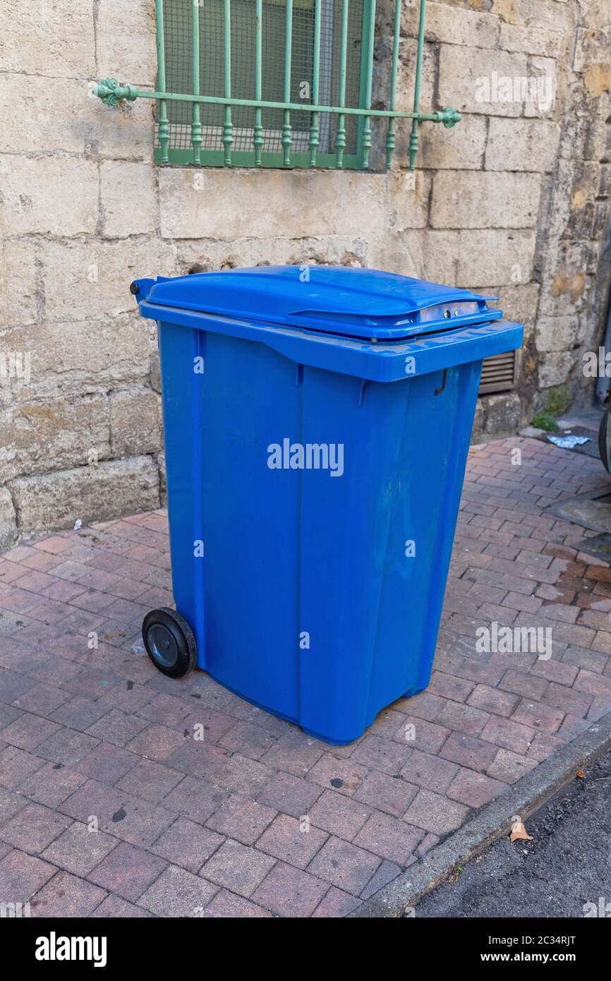 One Big Blue Wheelie Bin in Front of House Stock Photo - Alamy