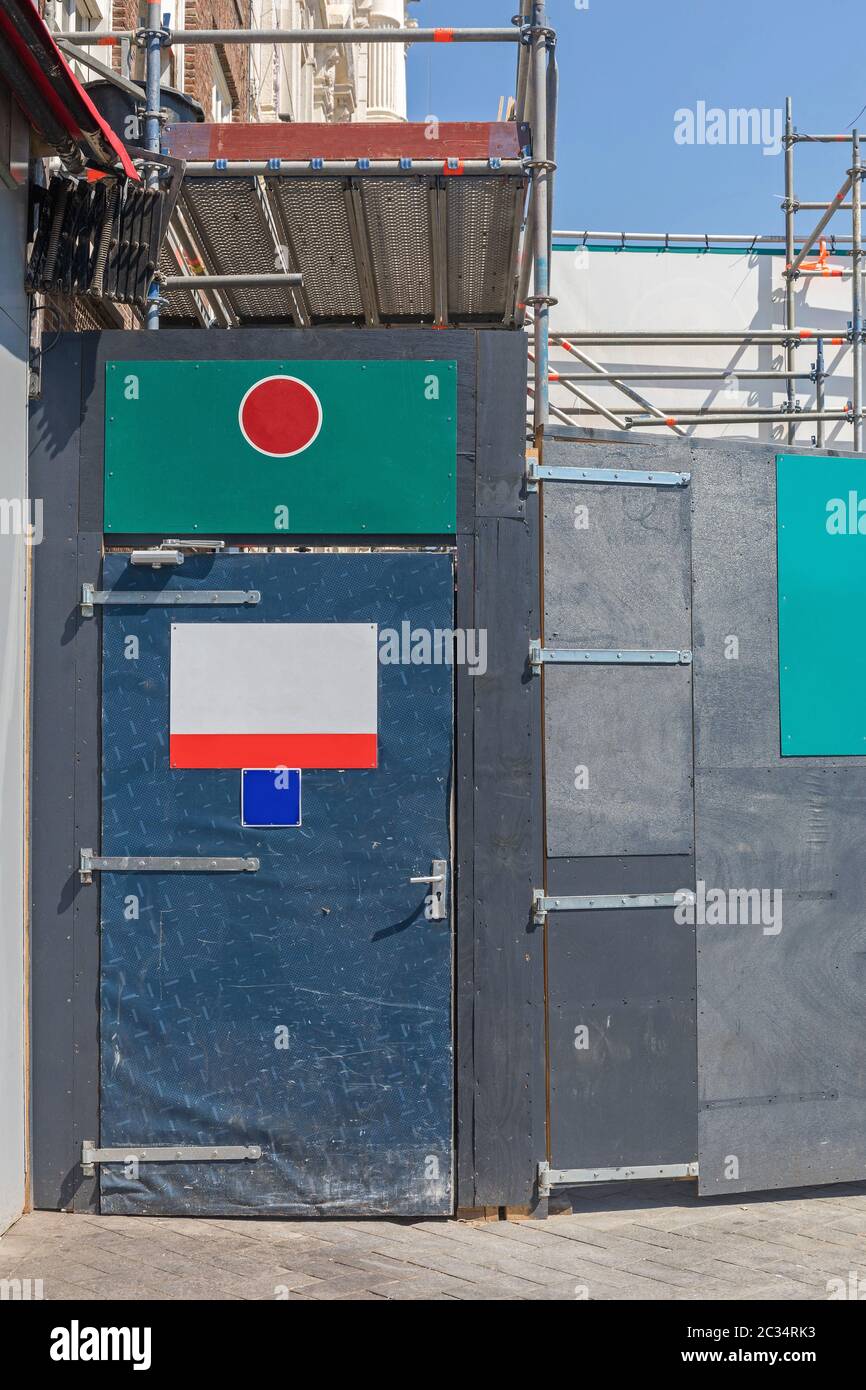 Entrance Door to Construction Site Scaffolding in City Stock Photo - Alamy