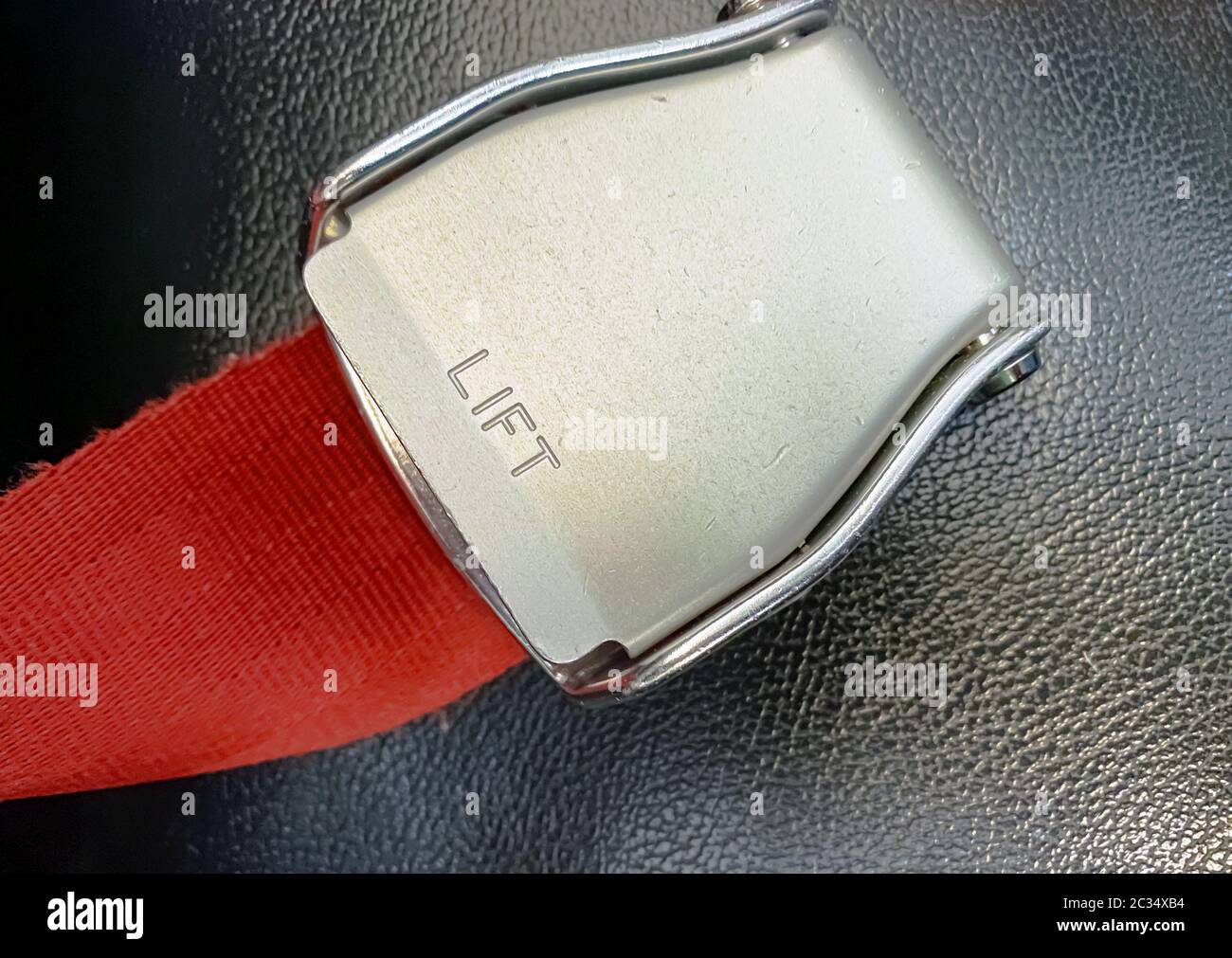 Close up of an aircraft safety belt buckle. Plane safety Stock Photo ...